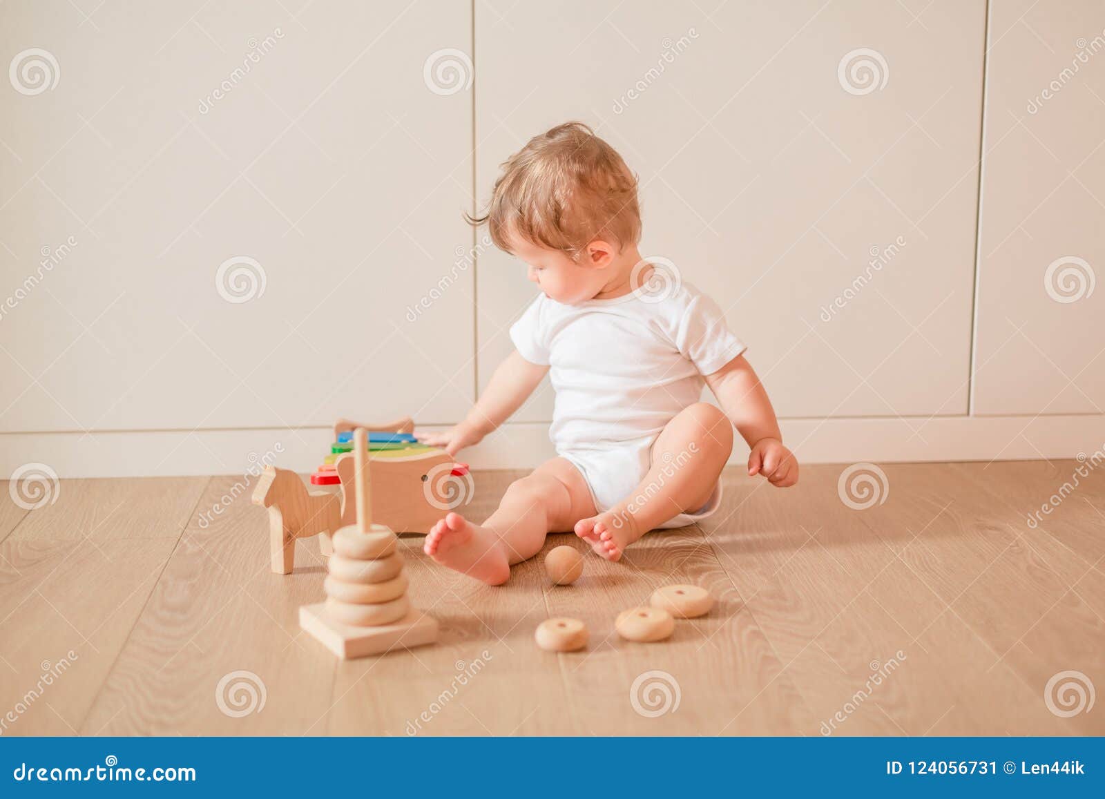 Cute Little Baby Boy Playing with Stacking Rings Stock Image - Image of ...