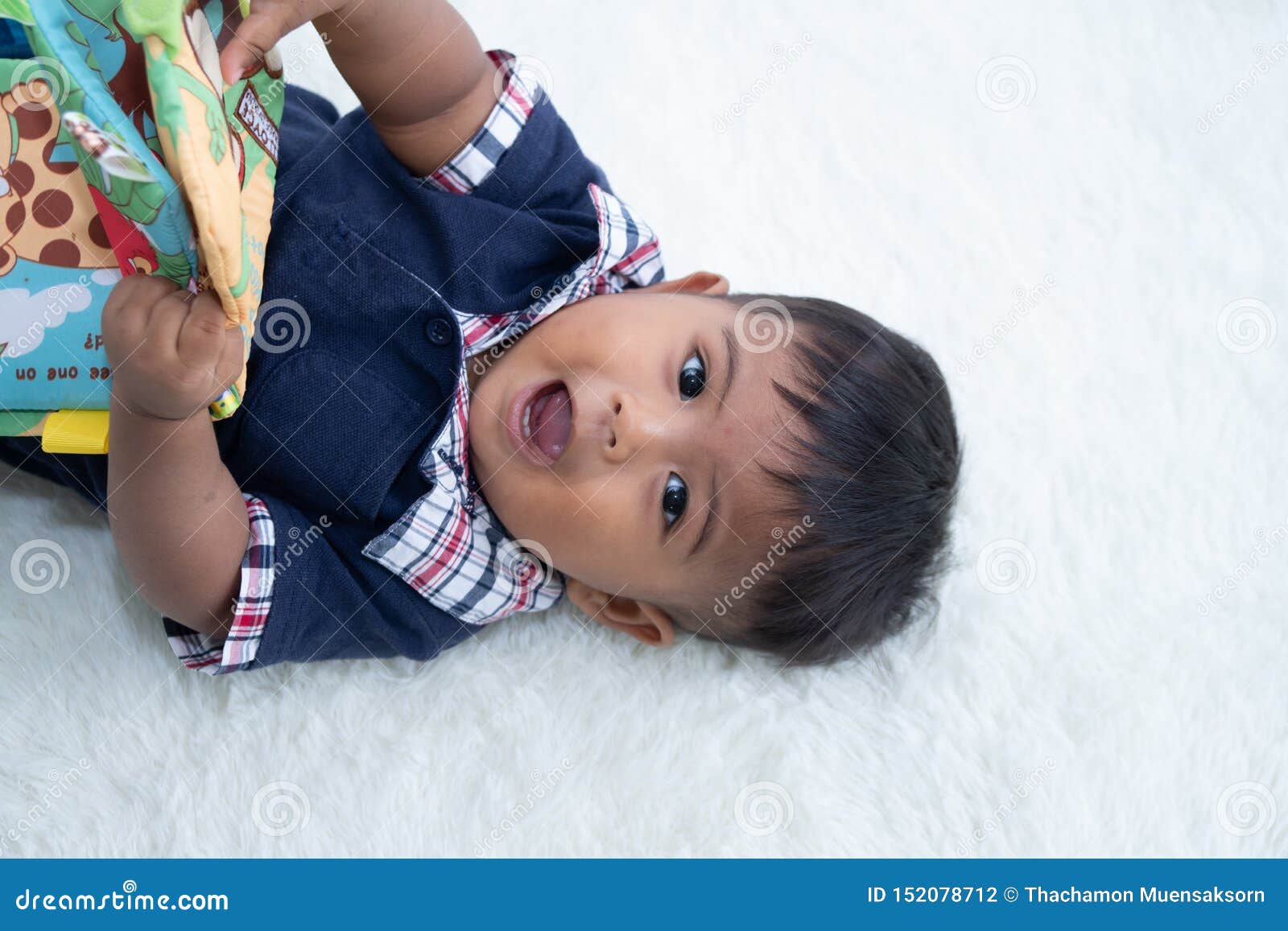 Cute Little Baby Boy Reading the Book Stock Photo - Image of pages ...
