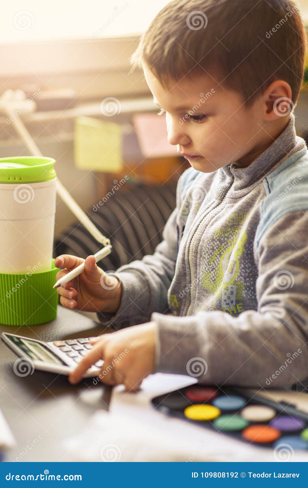 Cute Little Baby Boy Using a Calculator Stock Photo - Image of device ...