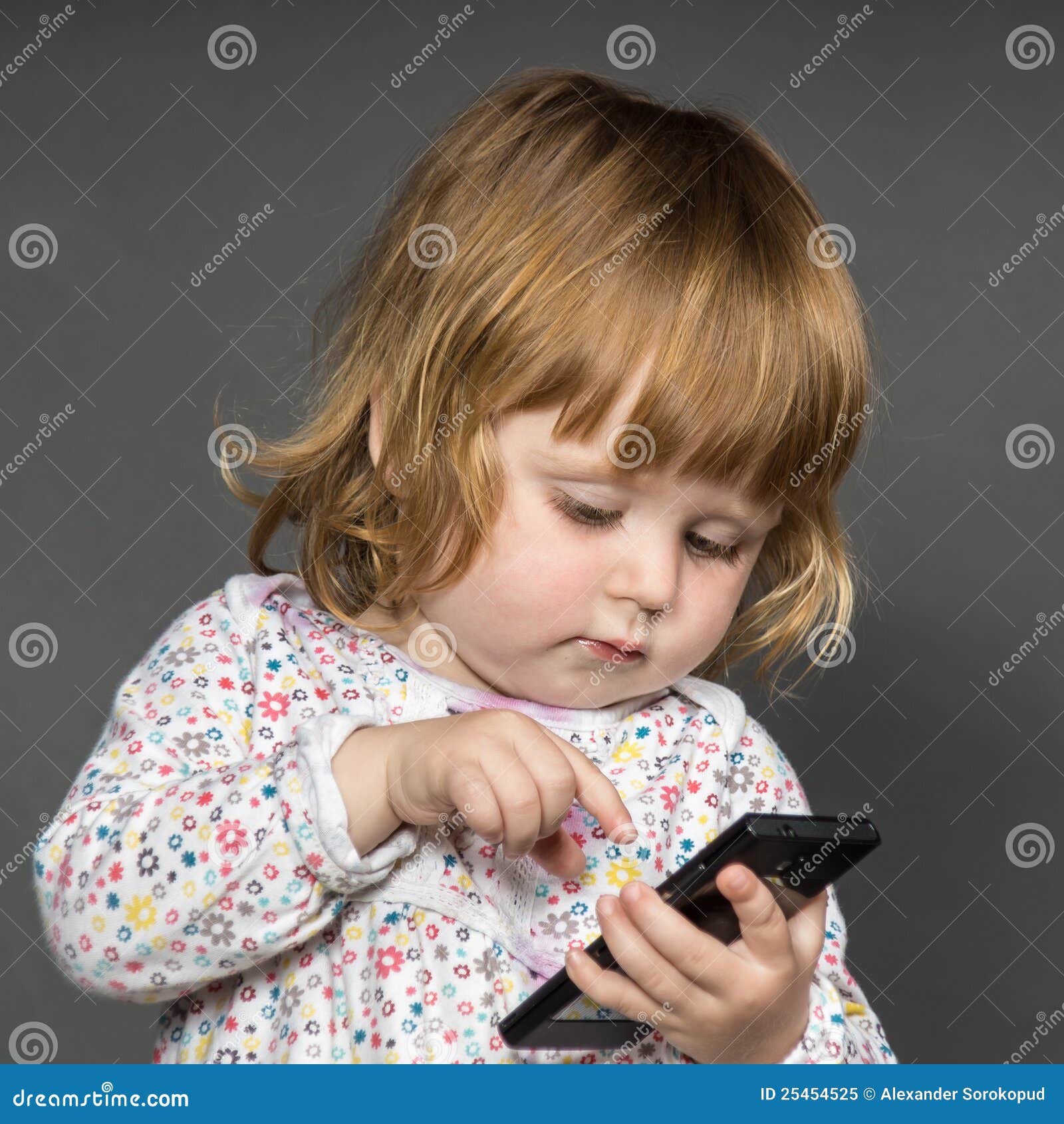 Cute Little Baby with Phone Stock Image - Image of looking, adorable ...