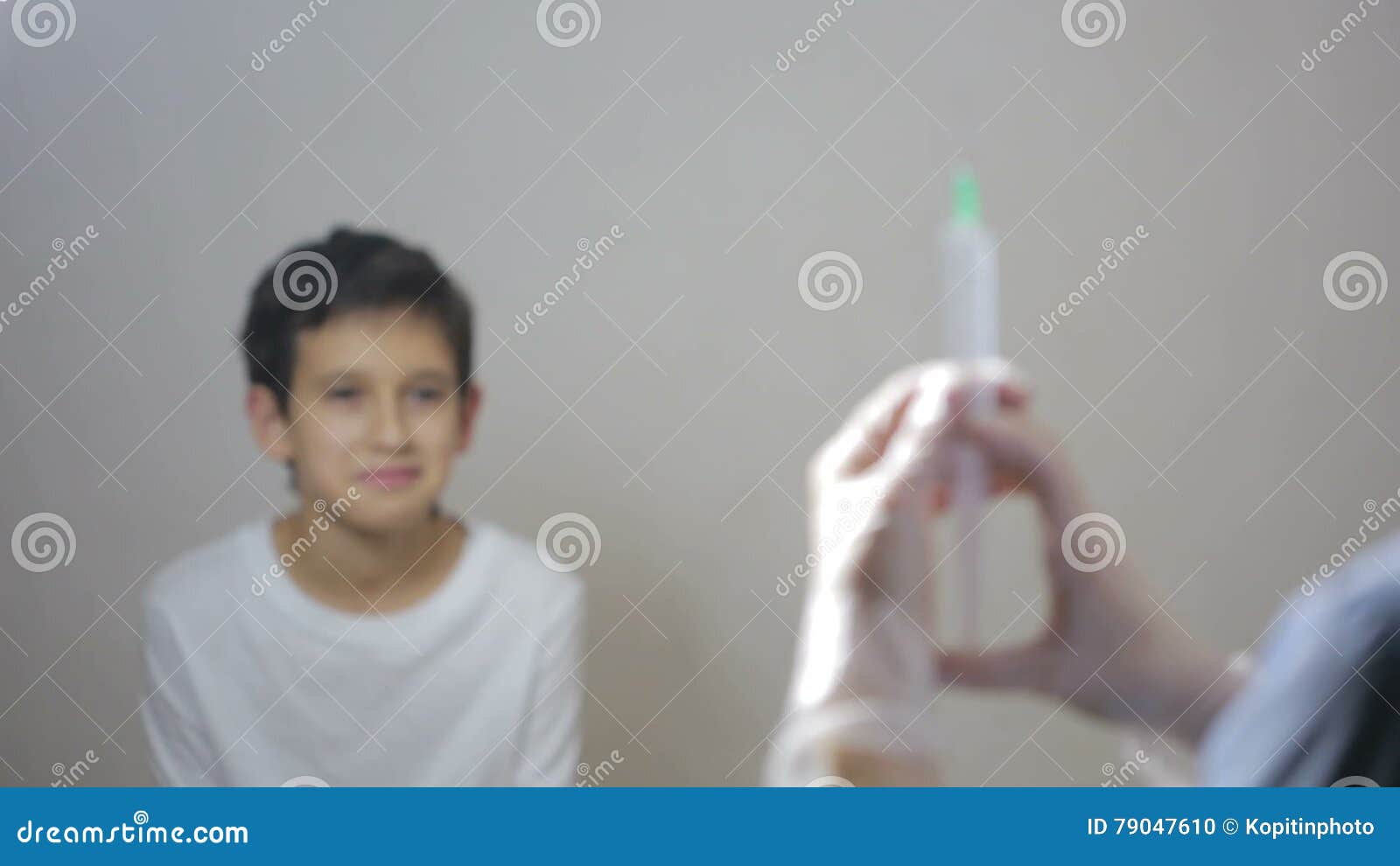 Cute Little Boy Afraid of Injection. Nurse Prepares a Syringe Stock ...