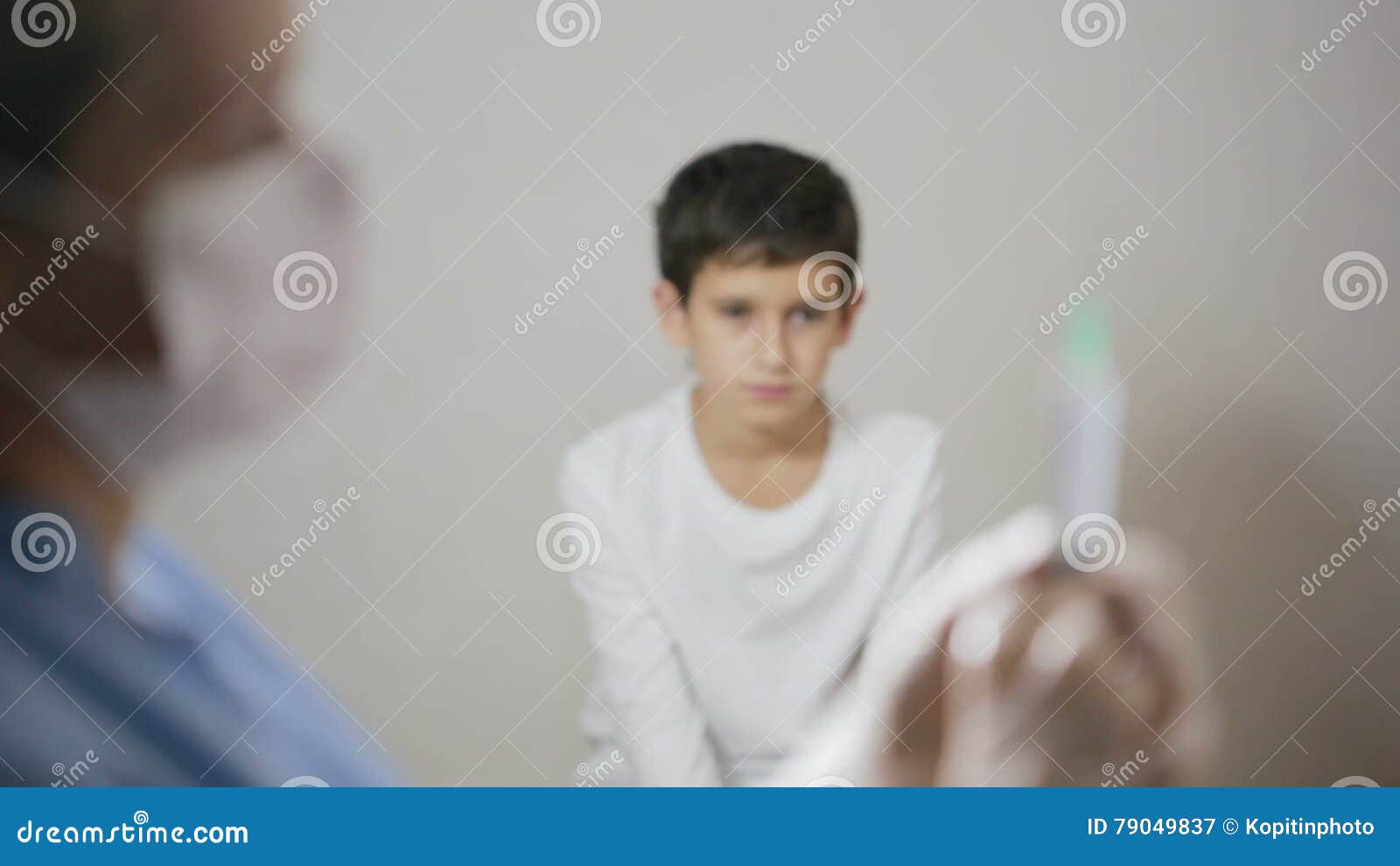 Cute Little Boy Afraid of Injection. Nurse Prepares a Syringe Stock ...