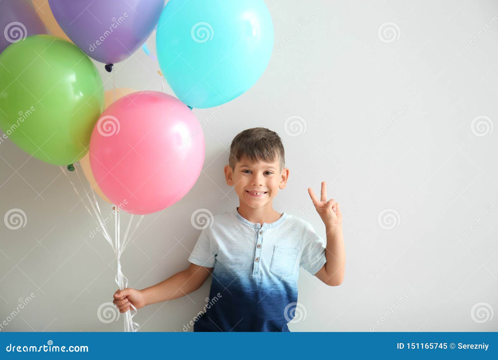 Cute Little Boy With Balloons On Light Background Royalty-Free Stock ...