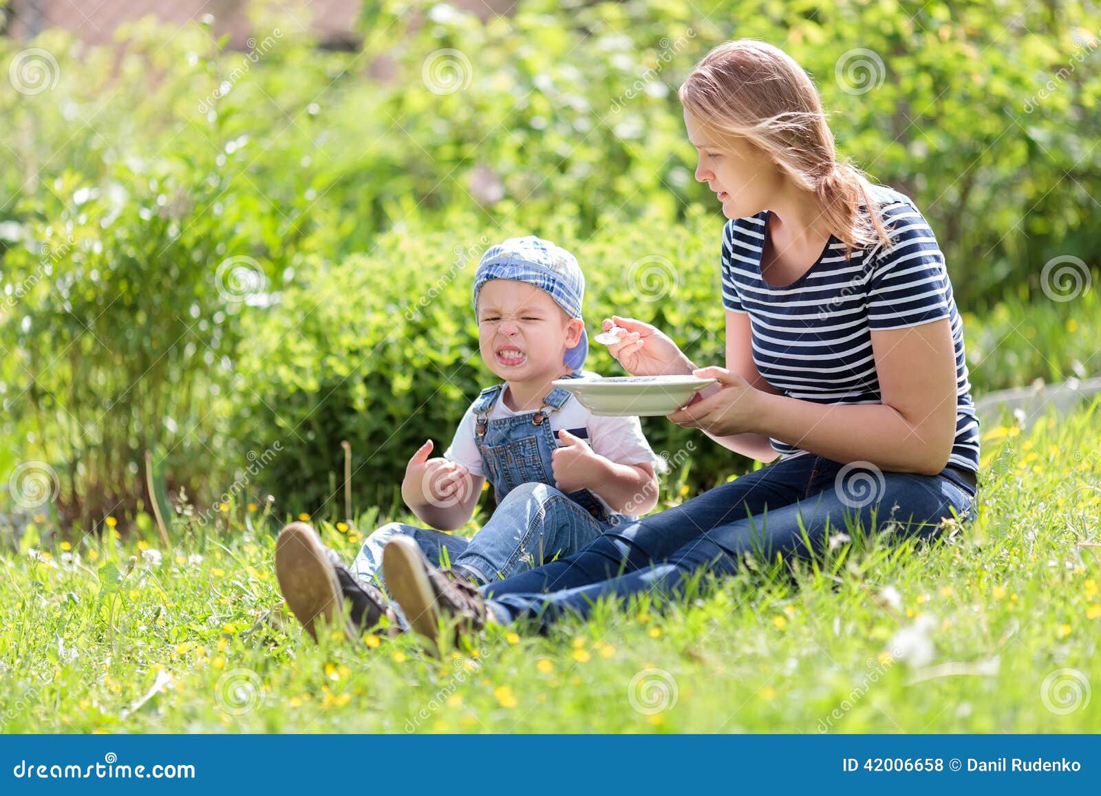 Cute Little Boy Being Fed Outdoors Grass Stock Photos - Free & Royalty ...