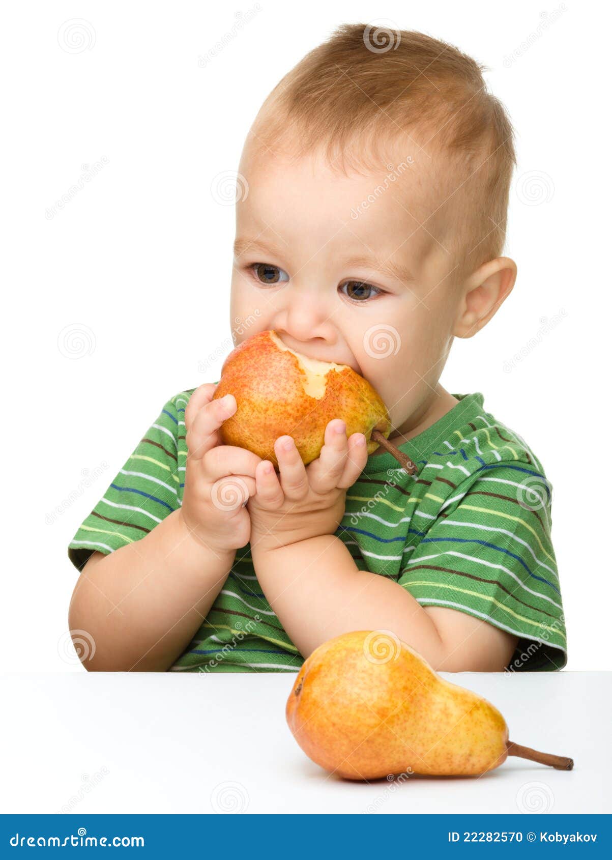 Cute Little Boy is Biting Pear Stock Photo - Image of dieting, brunette ...