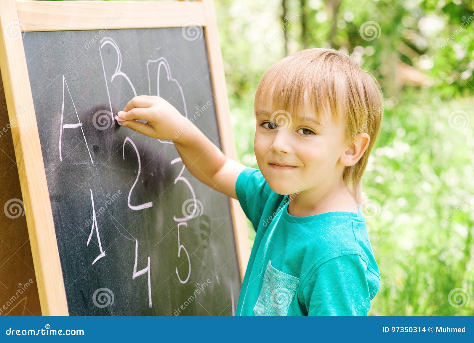 Cute Little Boy at Blackboard Practicing Counting and Math Outdoor ...