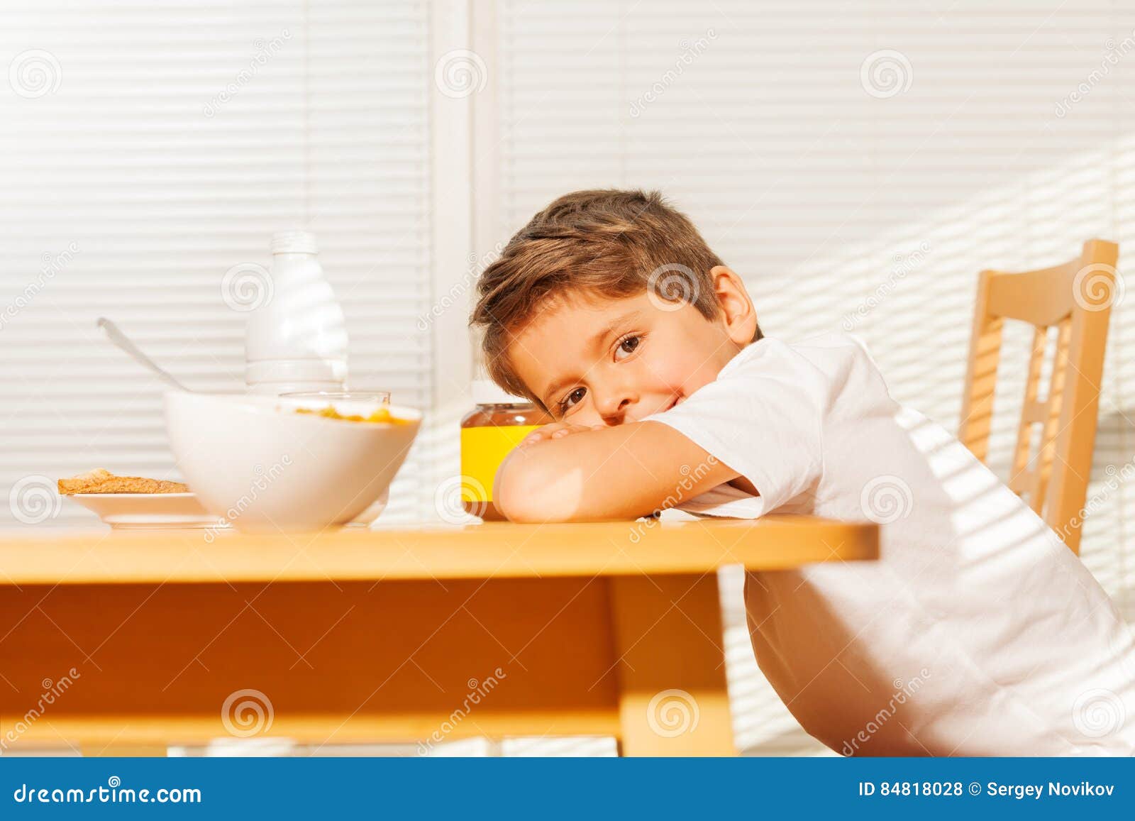 Cute Little Boy during Breakfast in the Kitchen Stock Photo - Image of ...