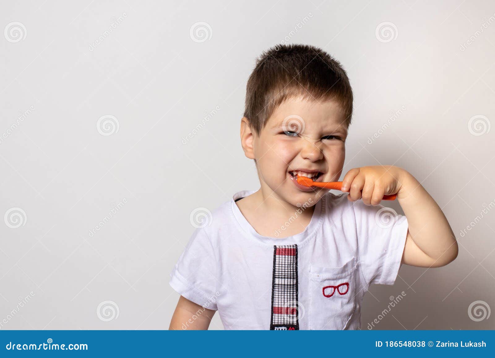 Cute Little Boy Brushing Teeth, Isolated on White Stock Photo - Image ...