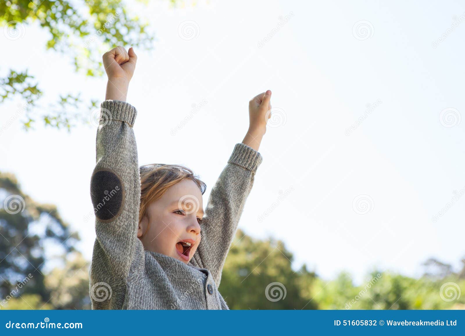 Cute Little Boy Cheering in Park Stock Photo - Image of sunny ...
