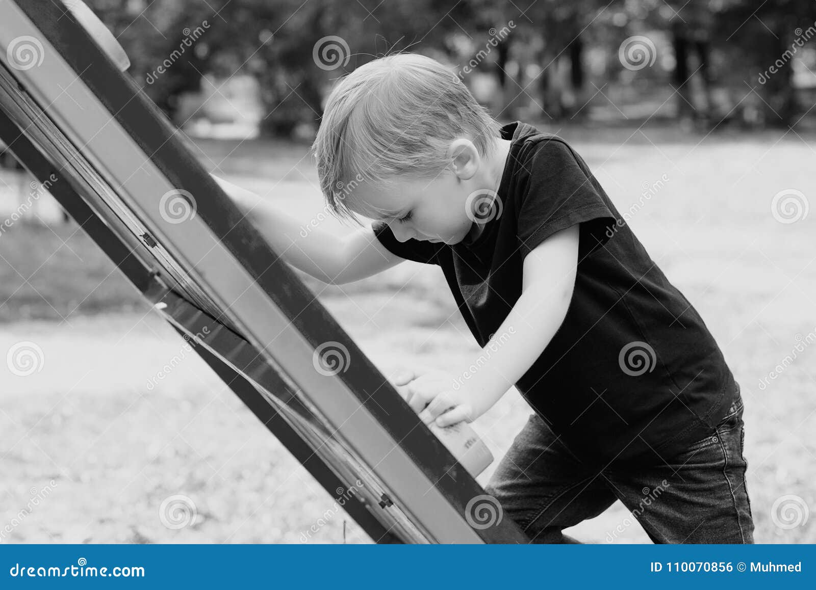 Cute Little Boy Climbing at Playground , Outdoors, Black Abd White ... Cute Little Boy Climbing at Playground , Outdoors, Black Abd White ...