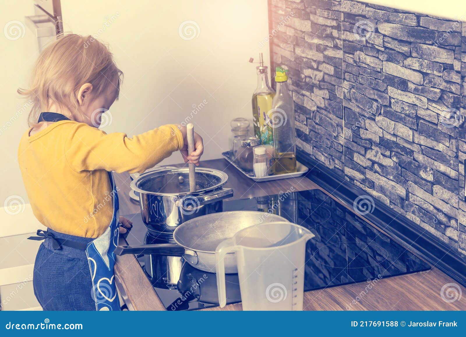 Cute Little Boy is Cooking in the Kitchen Stock Photo - Image of cute ...