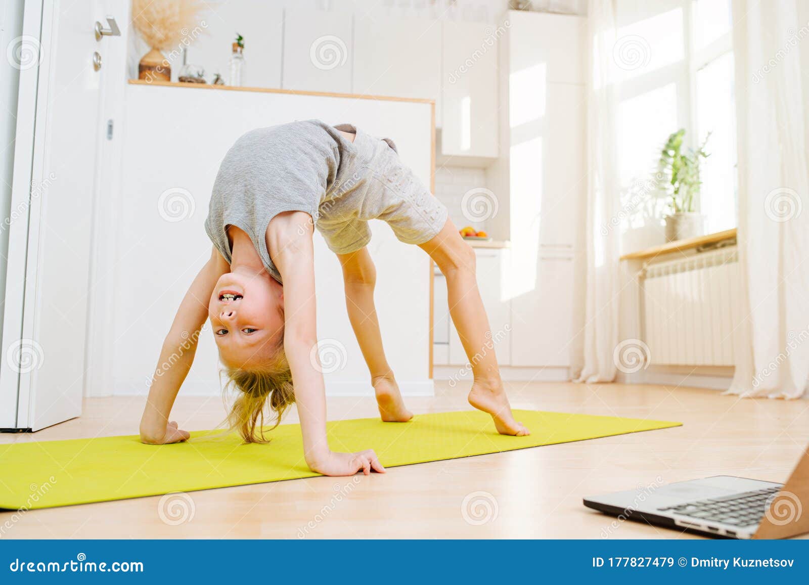 Little Boy Doing Full Bridge Exercise, Looking at Camera. on Isolation ...