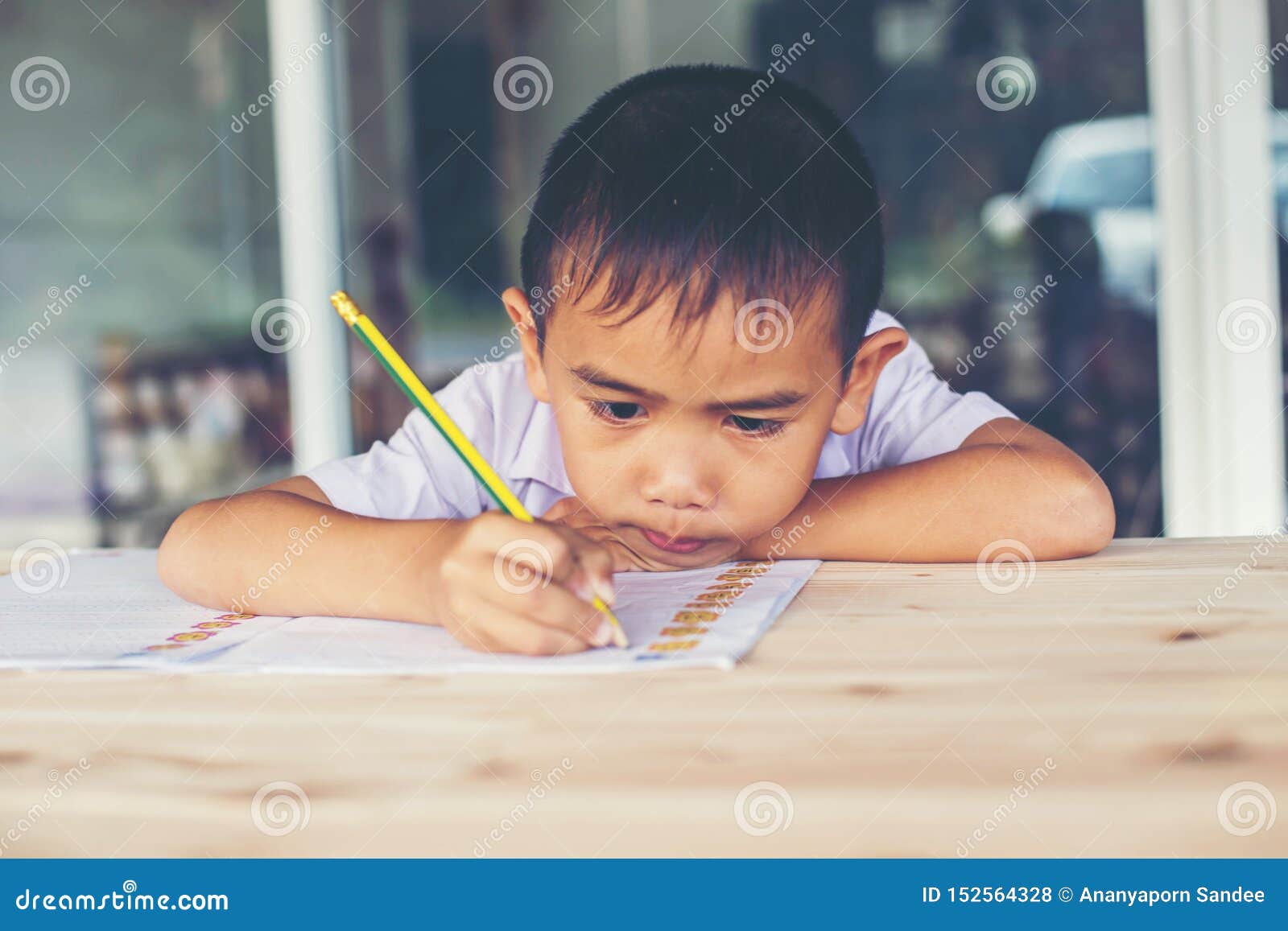 Cute Little Boy Doing His Homework Stock Photo - Image of desk ...