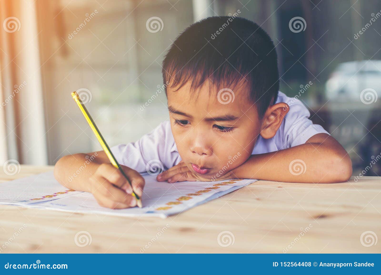 Cute Little Boy Doing His Homework Stock Photo - Image of learning ...