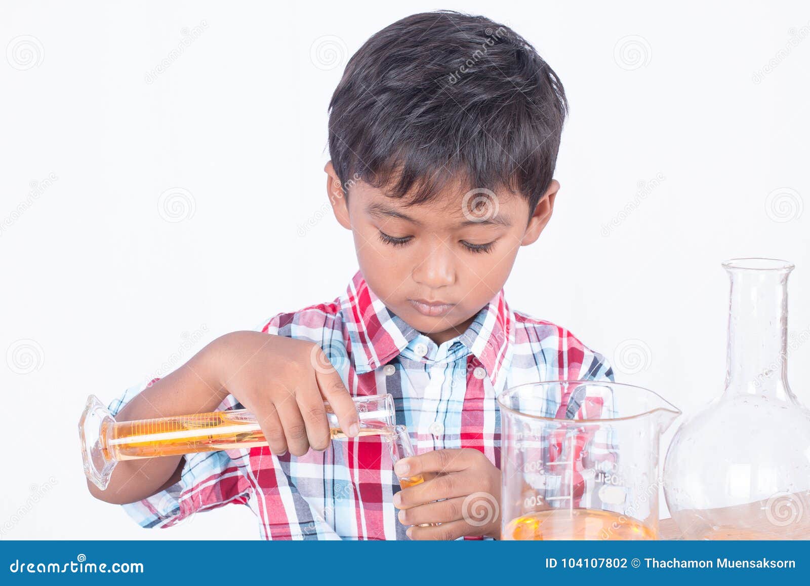 Cute Little Boy Doing Science Experiment Stock Photo - Image of looking ...