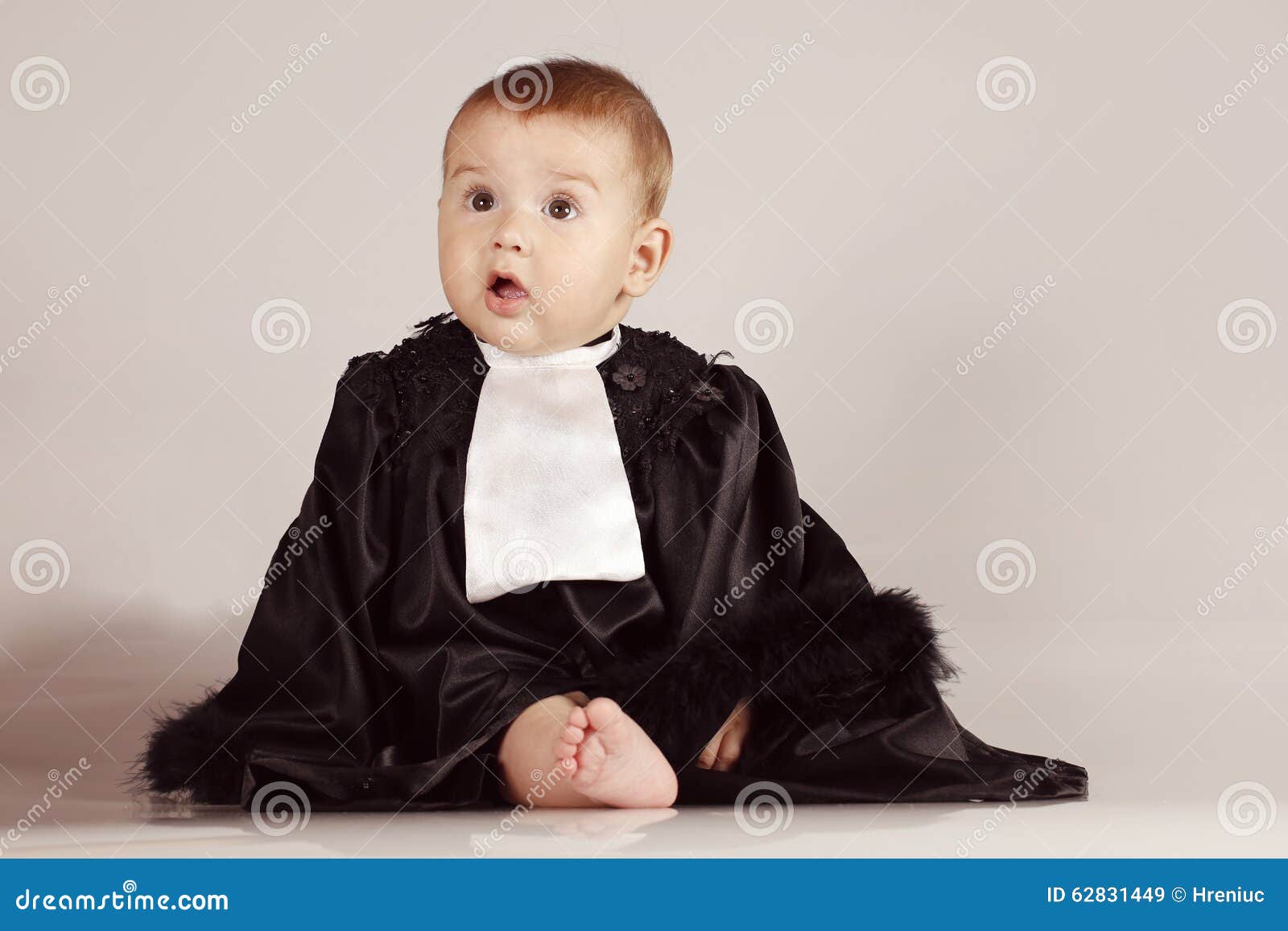 Cute Little Boy Dressed in Robe Having Fun and Smiling on Isolated ...
