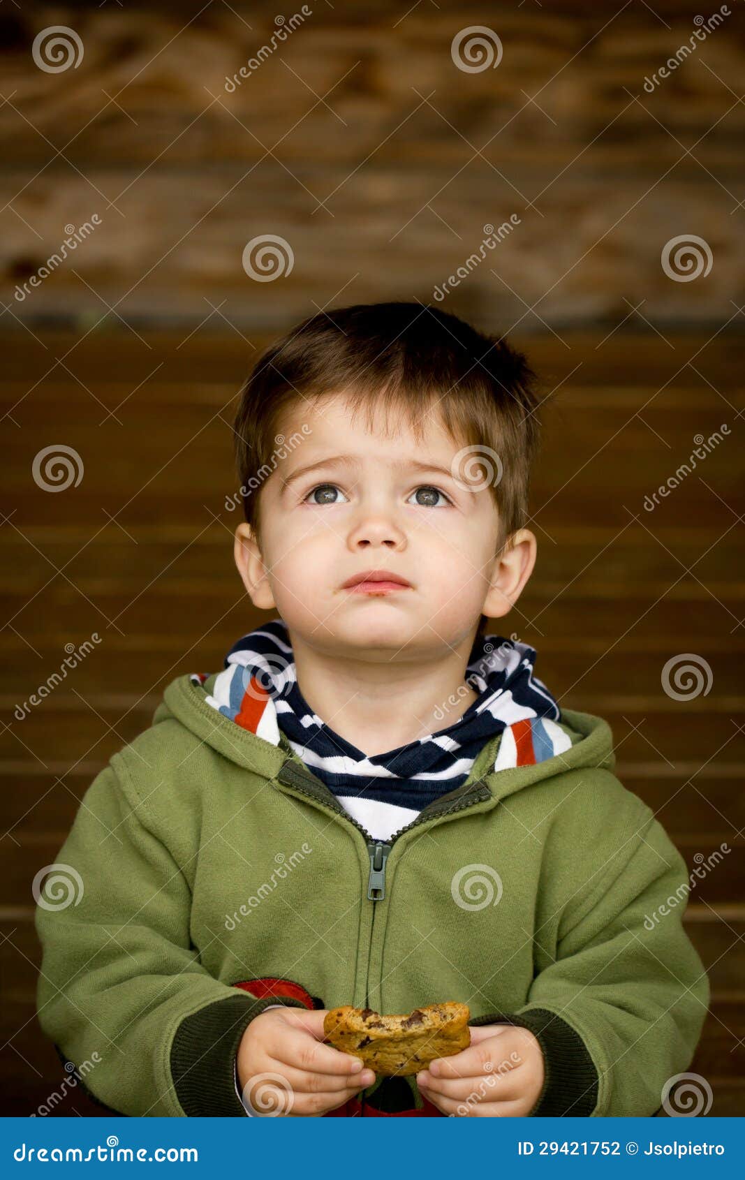 Cute Little Boy Eating a Cookie Stock Photo - Image of cookie, snack ...
