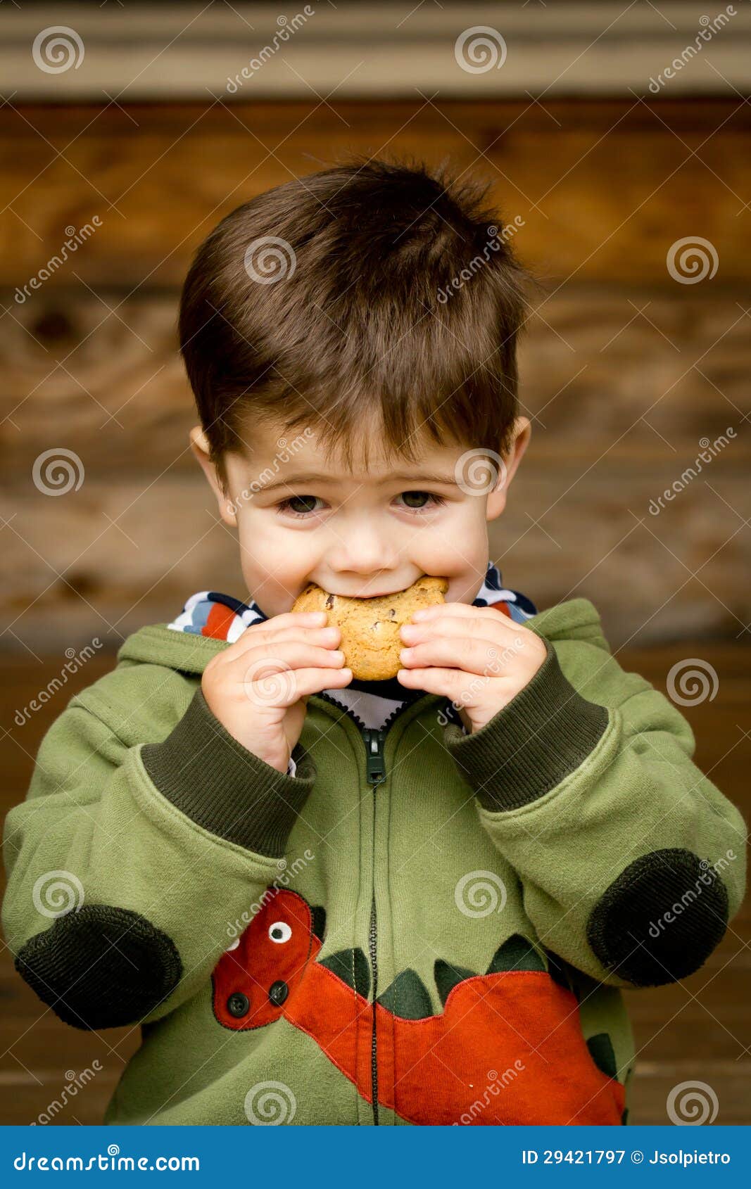 Cute Little Boy Eating a Cookie Stock Image - Image of treat, child ...