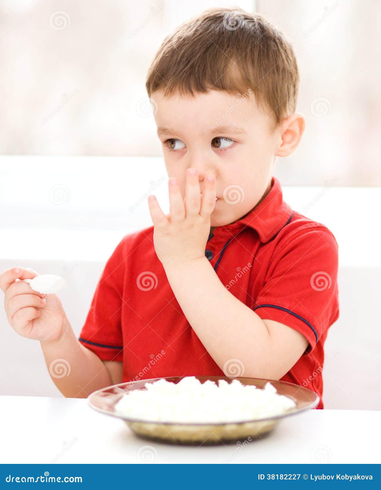 Cute Little Boy is Eating Cottage Cheese Stock Image - Image of snack ...