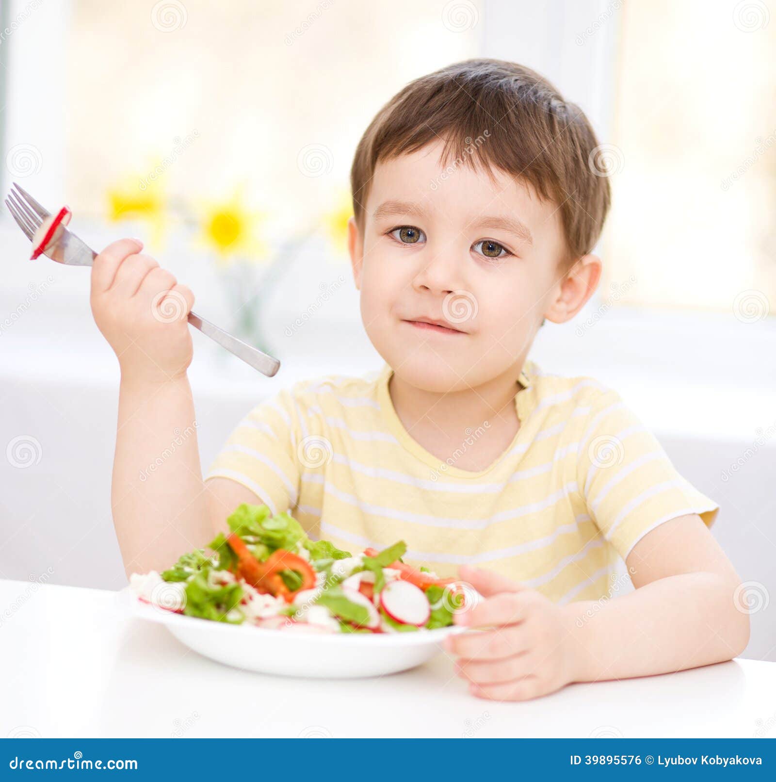 Cute Little Boy is Eating Vegetable Salad Stock Photo - Image of ...