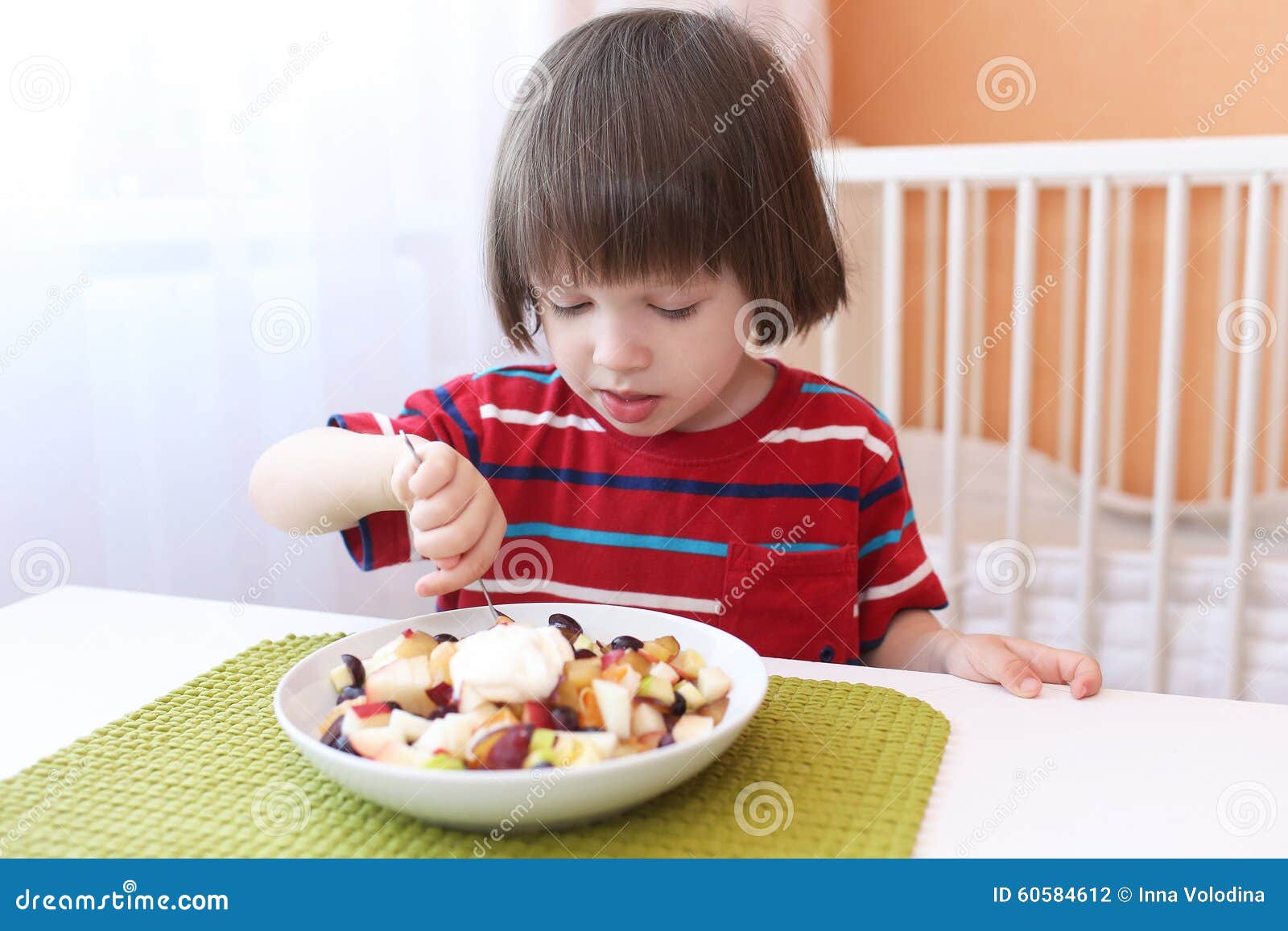 Cute Little Boy Eats Fruit Salad Stock Photo - Image of breakfast ...