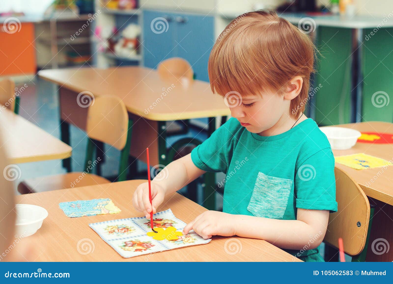 Cute Little Boy Engaged in Art and Craft in Classroom . Learning and ...