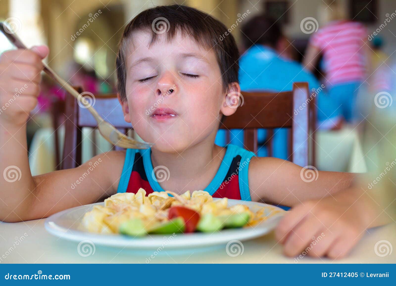 Cute Little Boy Enjoying Food Stock Image - Image of cook, eyes: 27412405