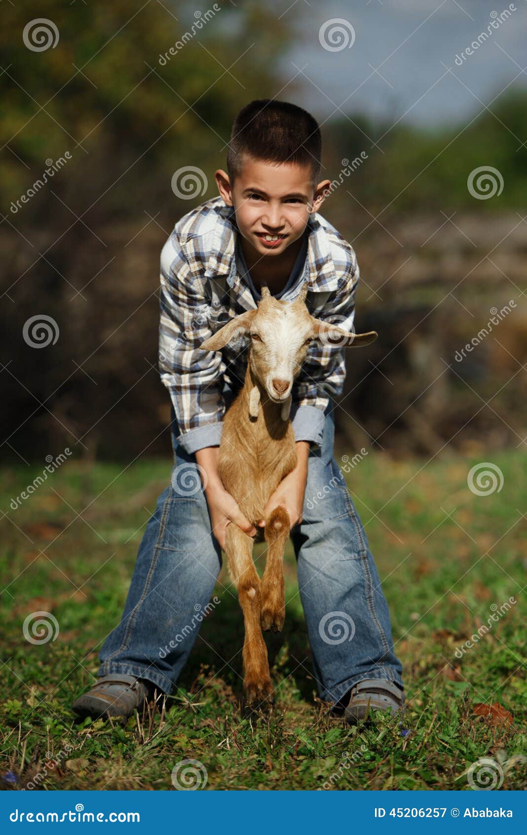 Cute little boy with goat stock image. Image of cute - 45206257
