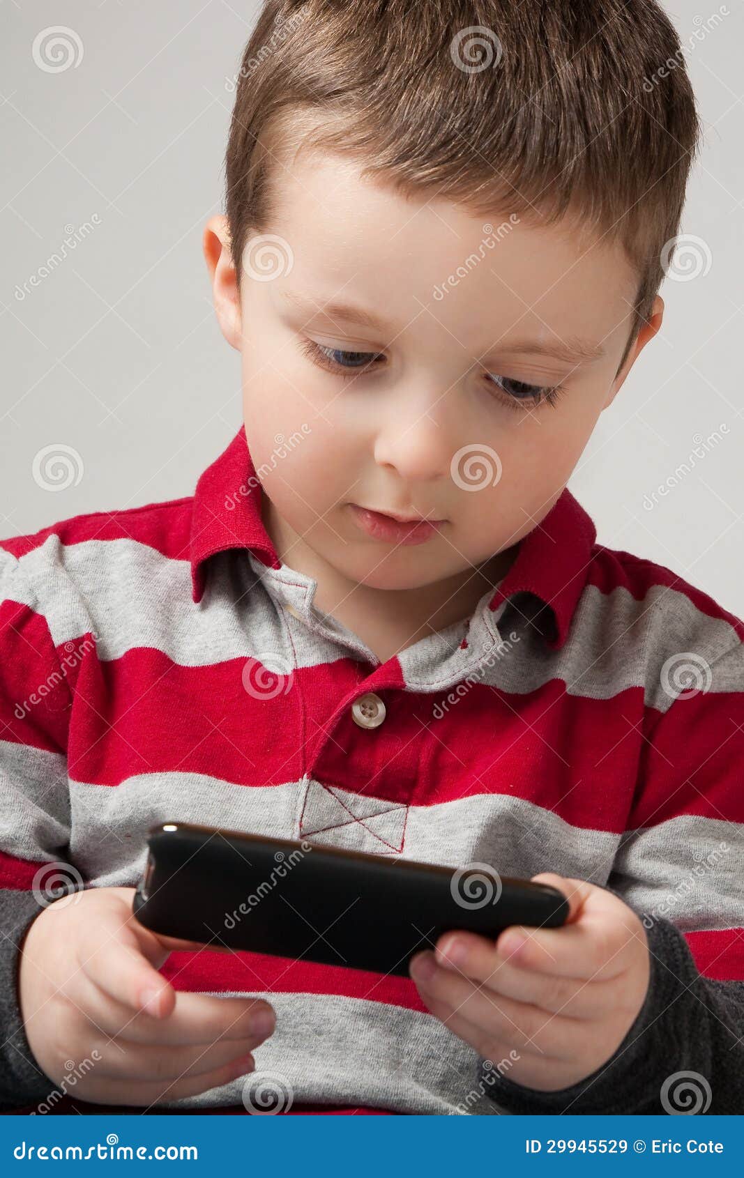 Boy playing video game stock image. Image of video, little - 29945529