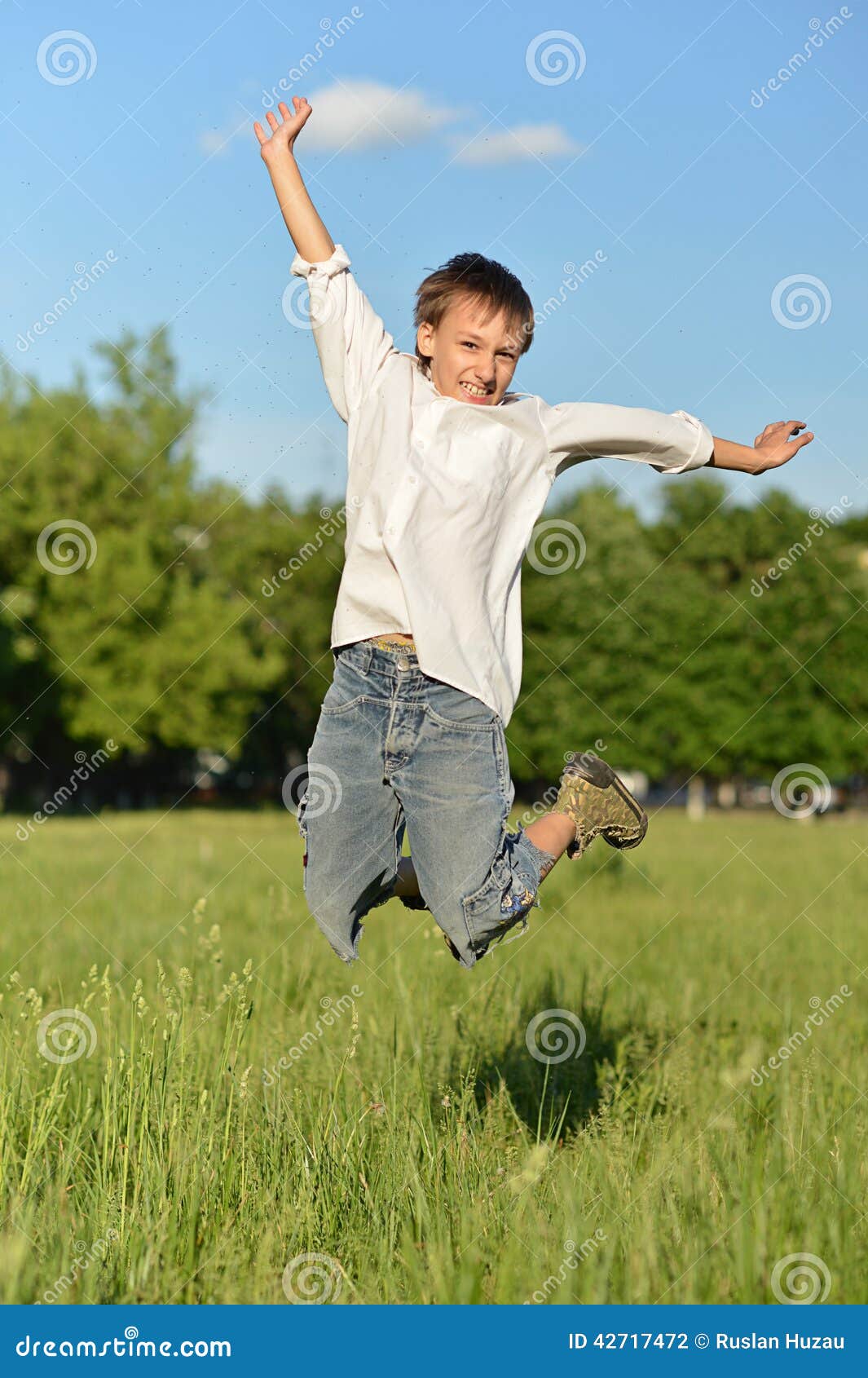 Cute little boy jumping stock photo. Image of outdoors - 42717472