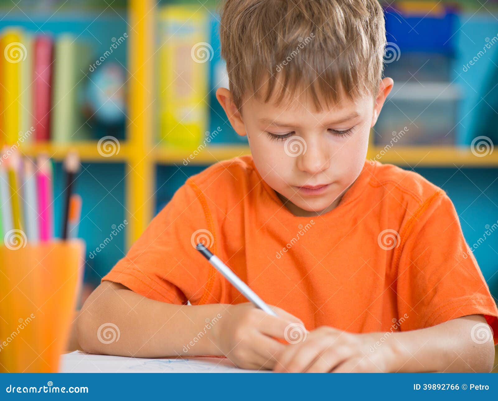 Cute little boy at lesson stock photo. Image of clever - 39892766