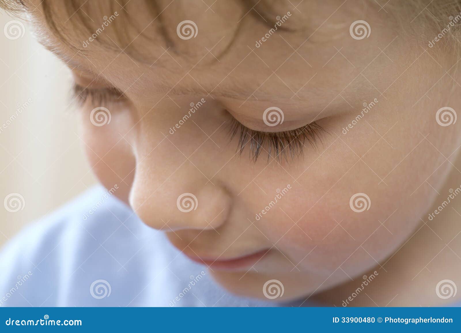 Cute Little Boy Looking Down Stock Photo - Image of caucasian, child ...