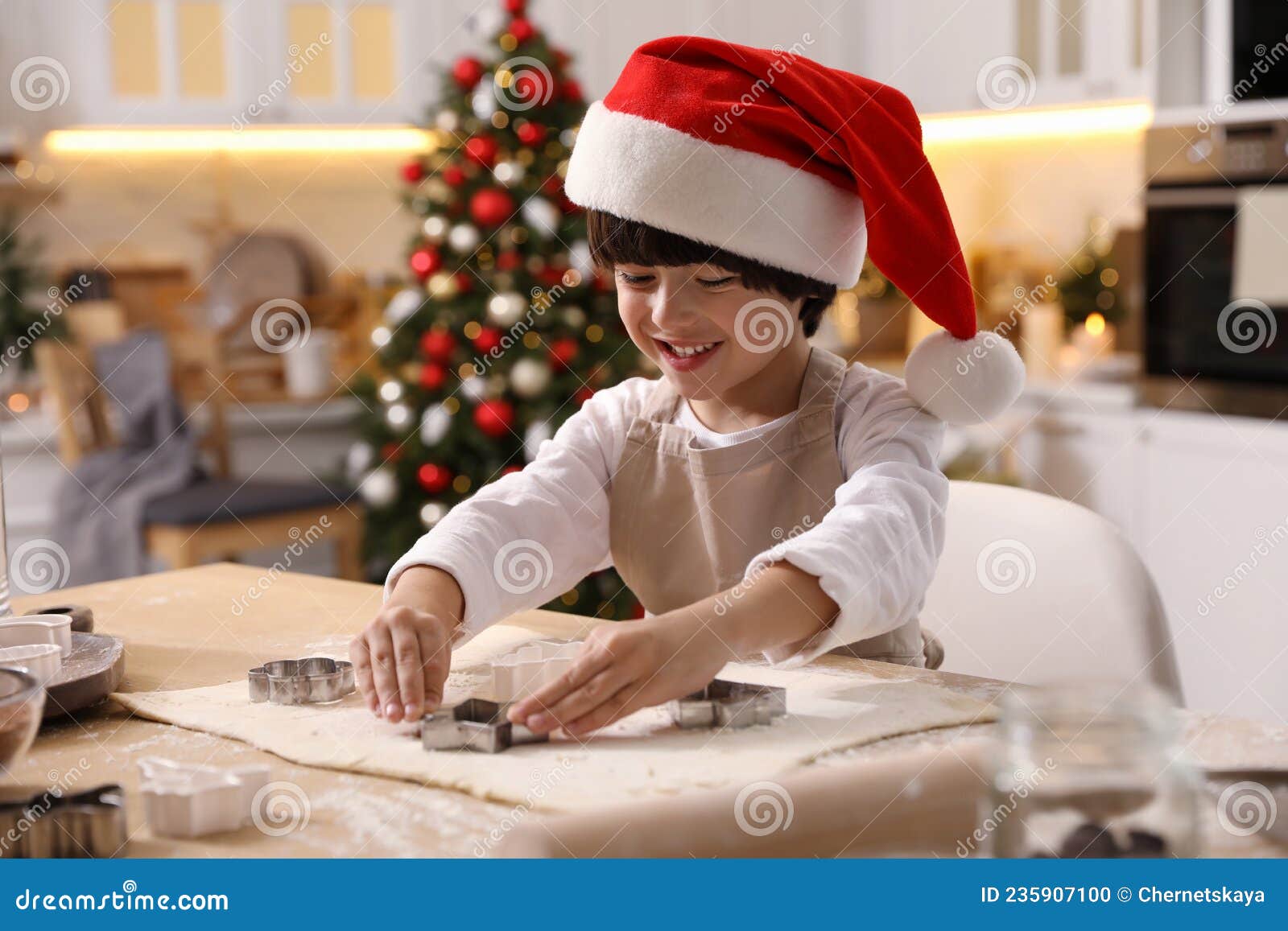 Cute Little Boy Making Christmas Cookies in Kitchen Stock Photo - Image ...