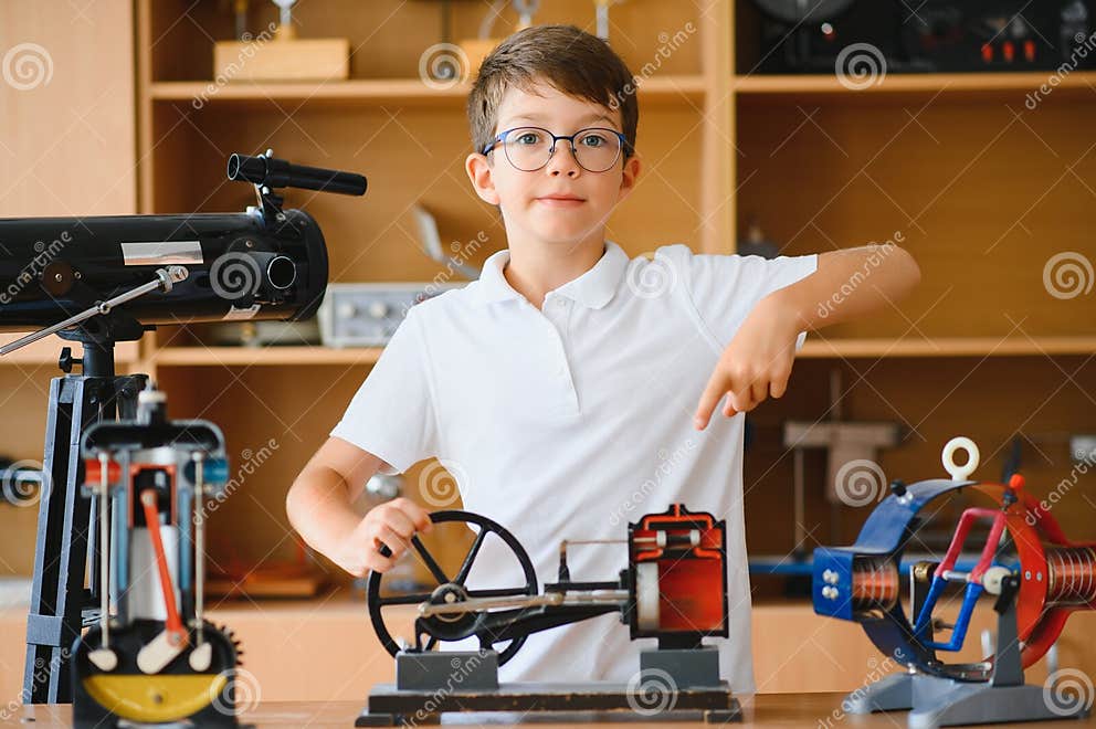 Cute Little Boy at Physics Lesson in Classroom Stock Image - Image of ...