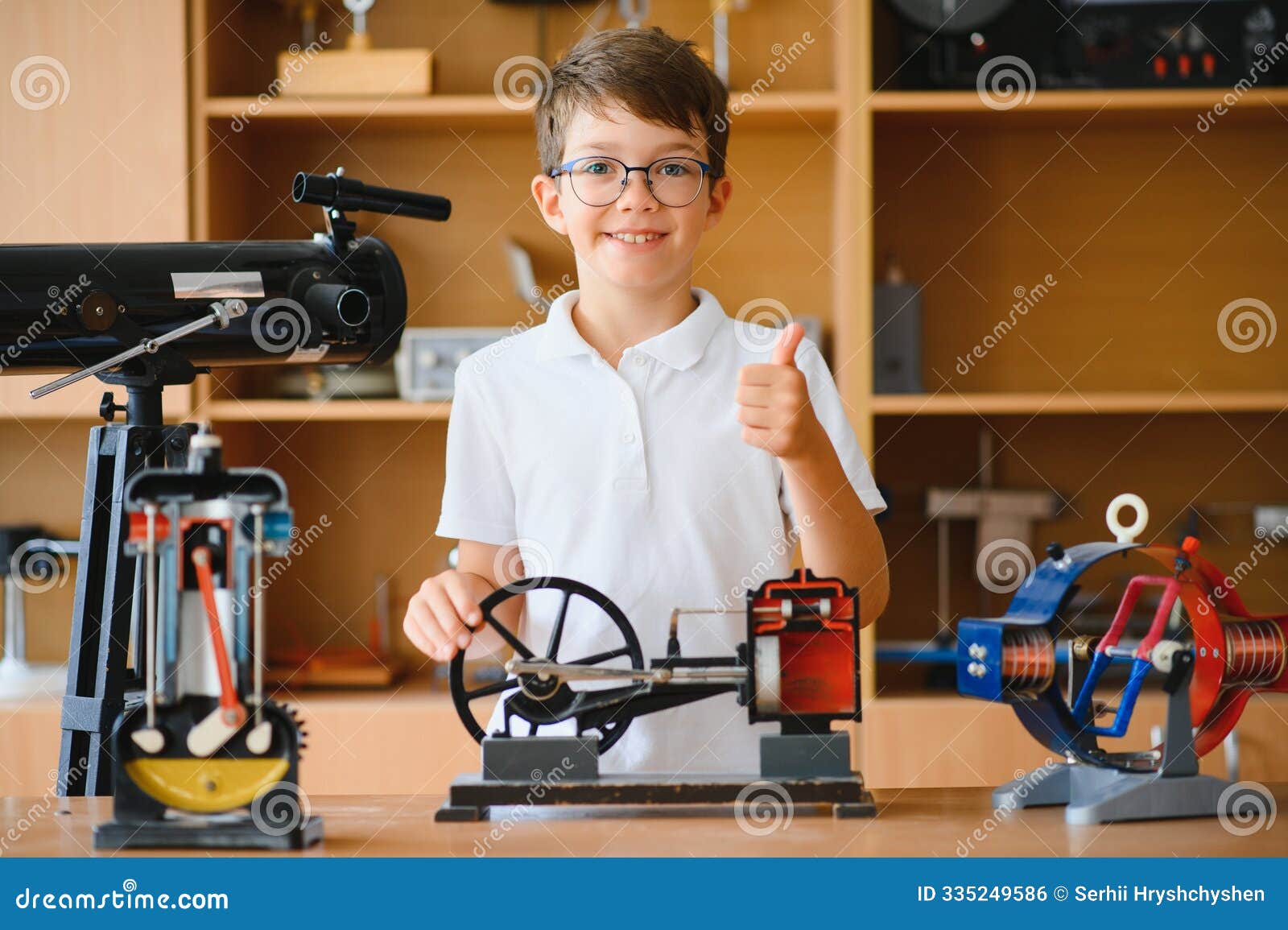 Cute Little Boy at Physics Lesson in Classroom Stock Photo - Image of ...