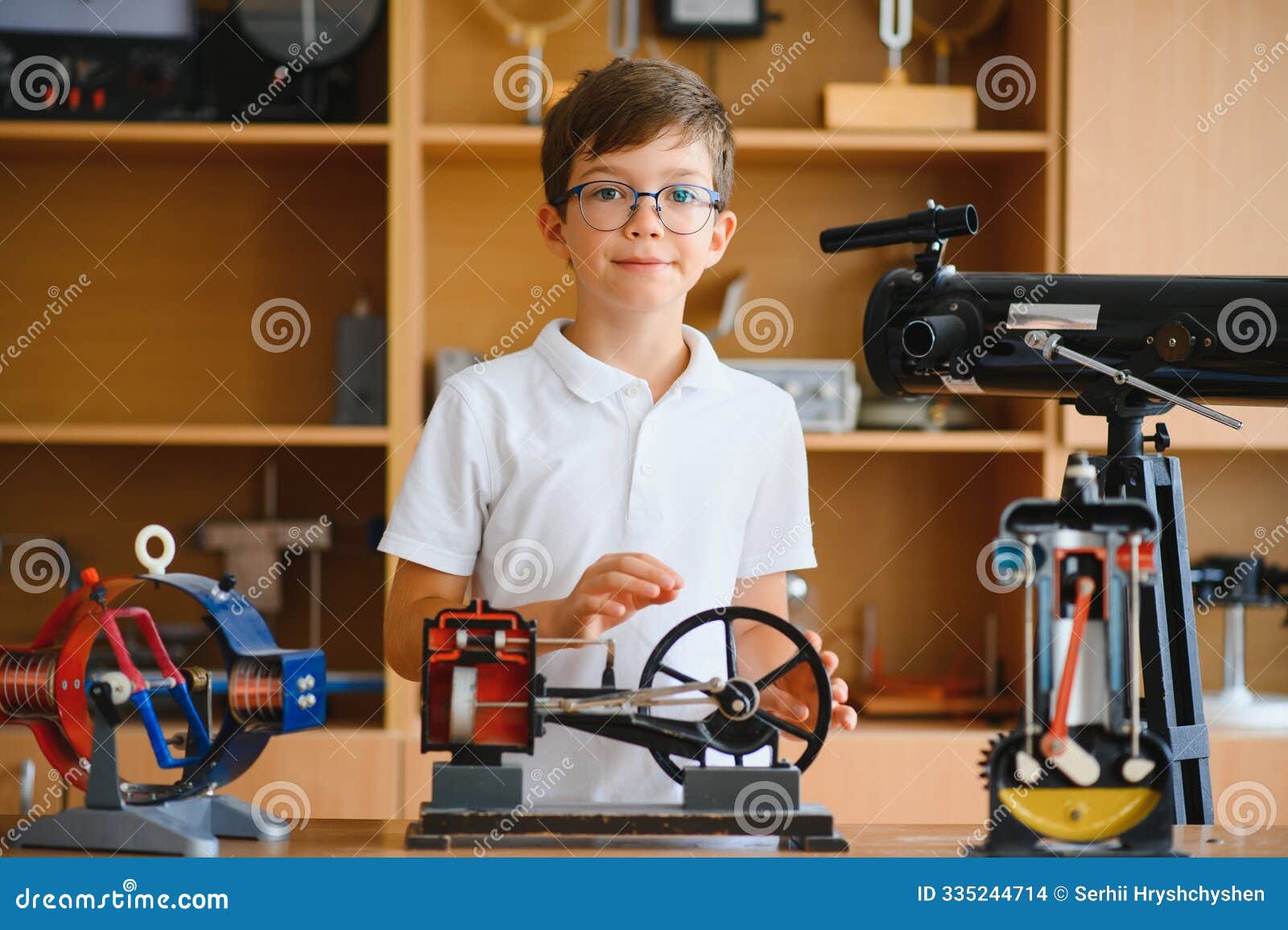 Cute Little Boy at Physics Lesson in Classroom Stock Photo - Image of ...