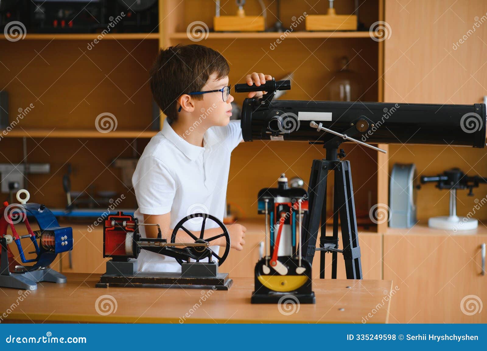 Cute Little Boy at Physics Lesson in Classroom Stock Photo - Image of ...