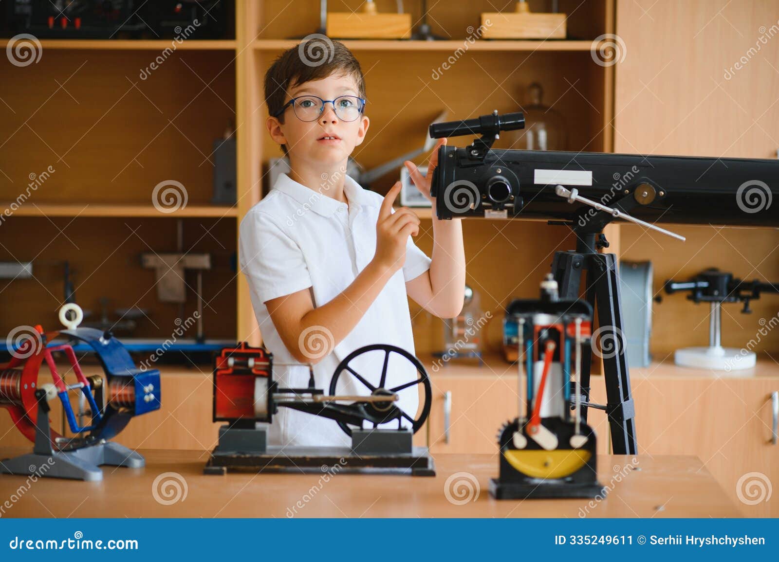Cute Little Boy at Physics Lesson in Classroom Stock Image - Image of ...