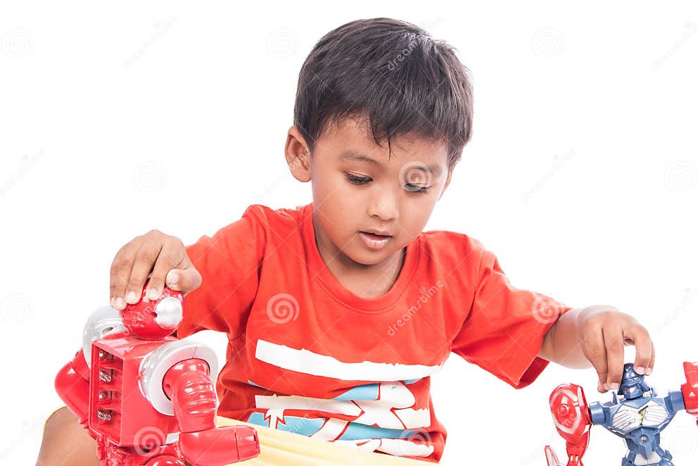 Cute little boy play robot stock image. Image of robot - 68905901