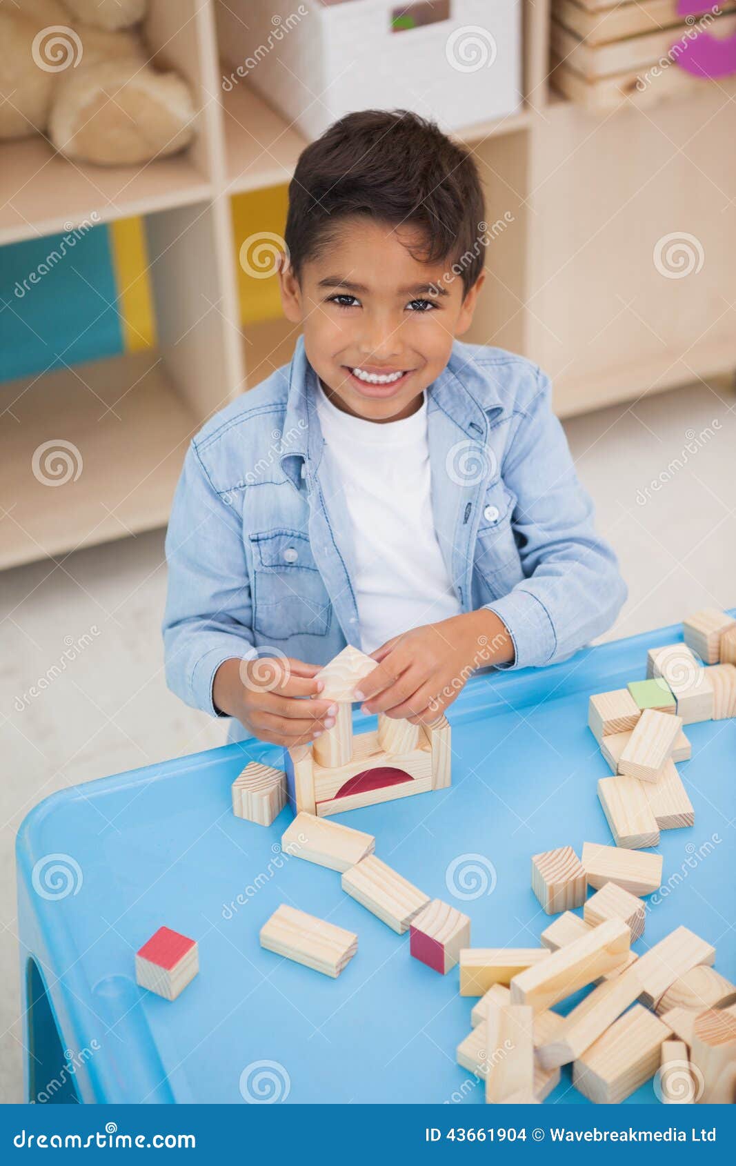 Cute Little Boy Playing with Building Blocks Stock Photo - Image of ...