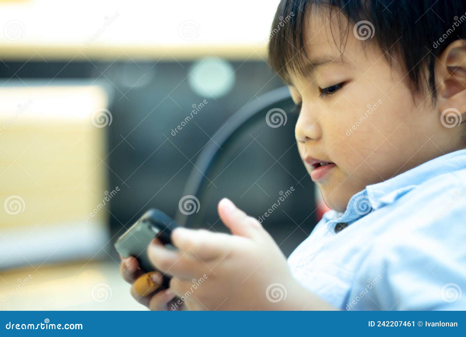 Cute Little Boy Playing Gadget Stock Image - Image of face, asian ...