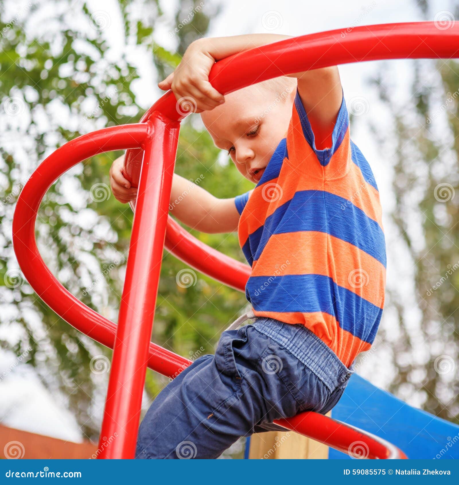 Cute Little Boy Playing on the Playground in the Summer Stock Image ...