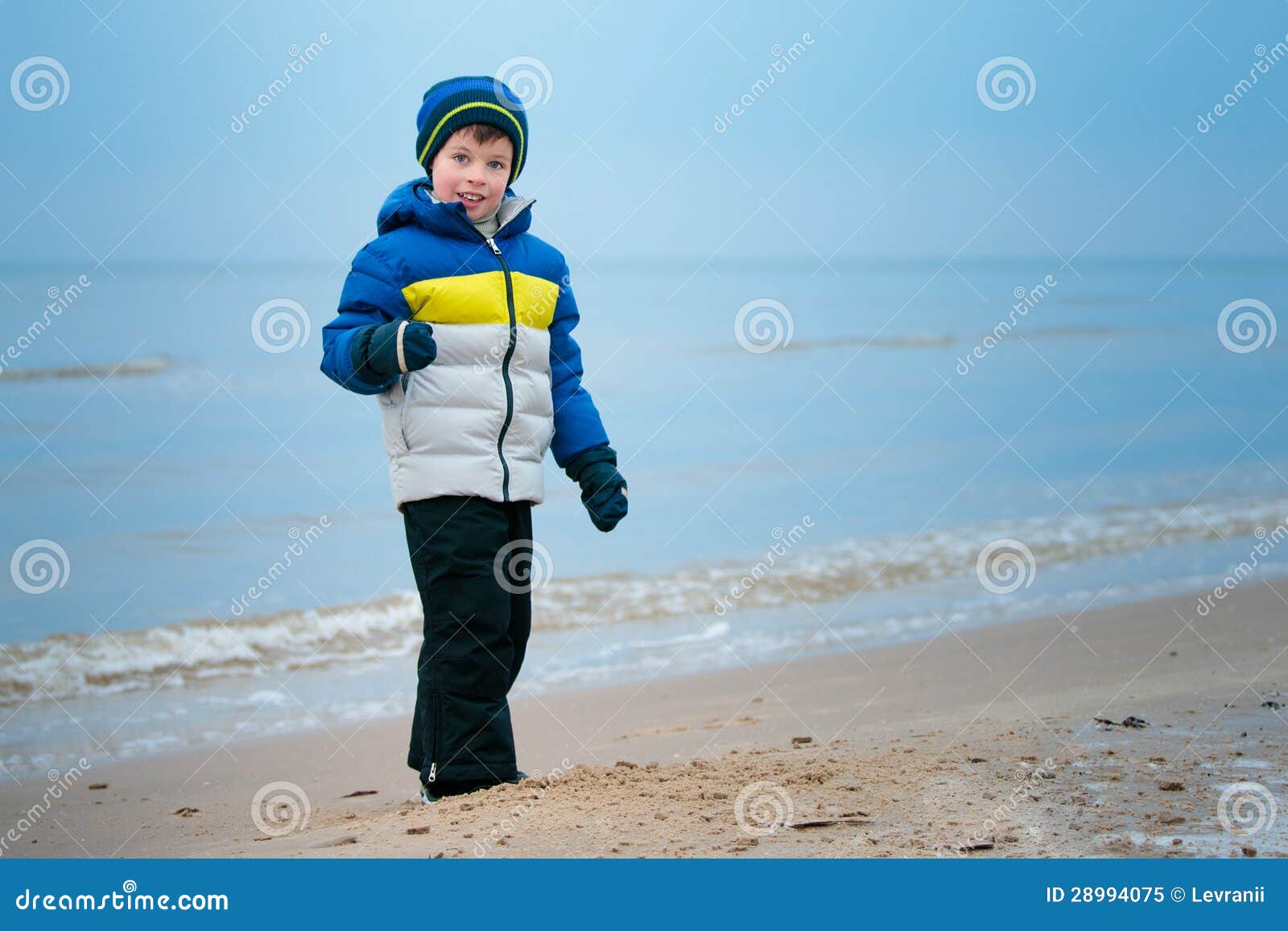 Cute Little Boy Playing on Winter Beach Stock Image - Image of hands ...