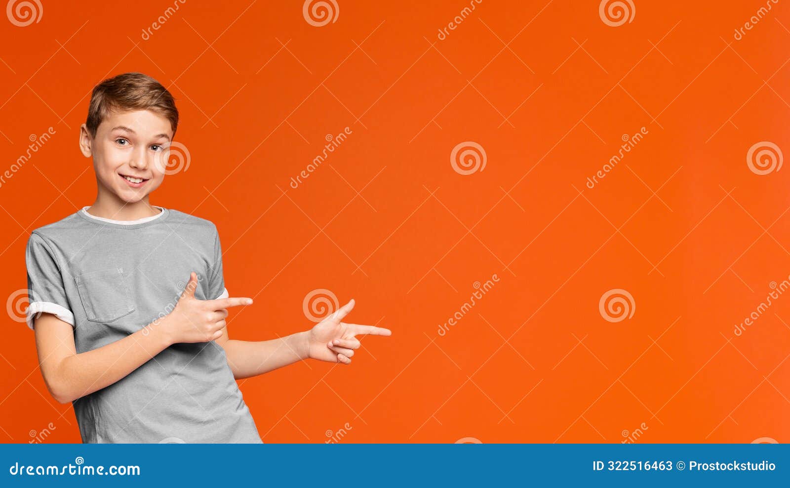 Cute Little Boy Pointing Away on Orange Background Stock Image - Image ...