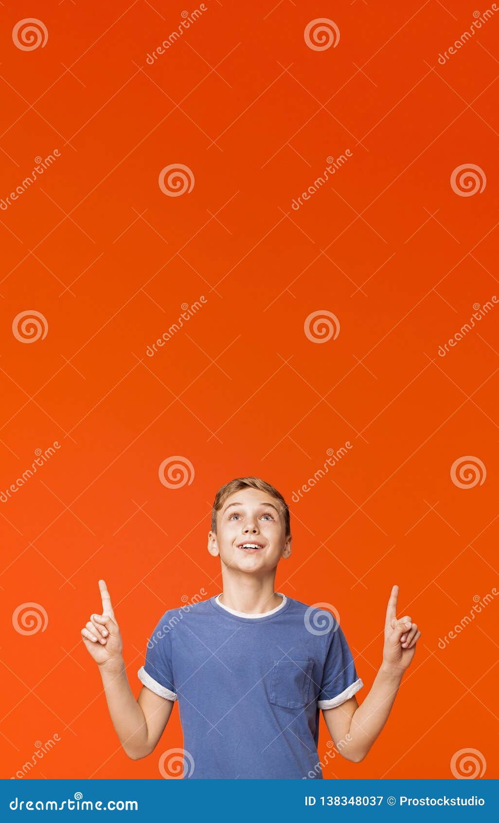 Cute Little Boy Pointing Up on Orange Background Stock Image - Image of ...