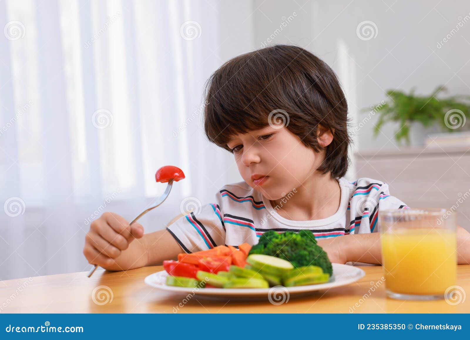 Cute Little Boy Refusing To Eat Vegetables at Home Stock Photo - Image ...