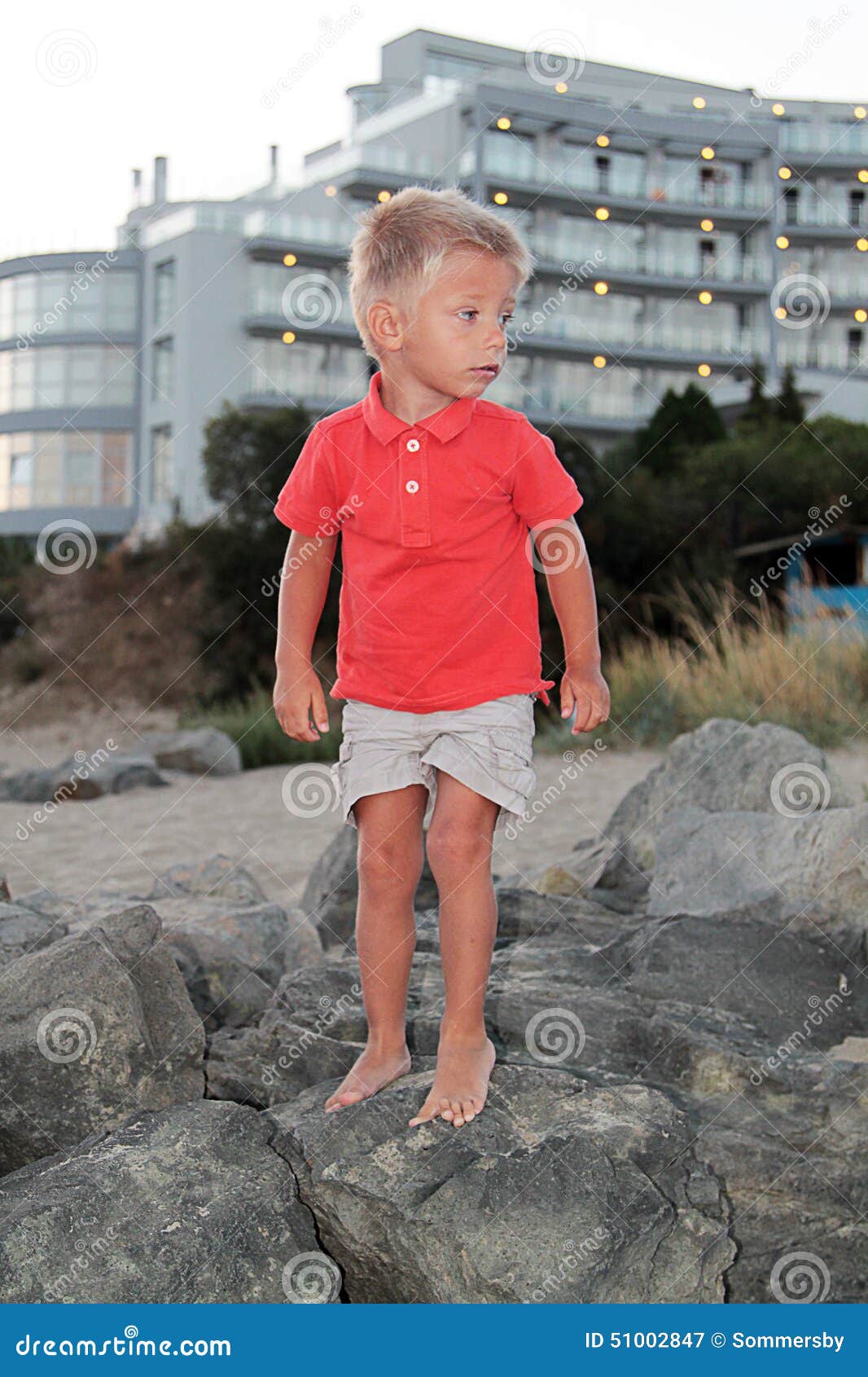 Cute Little Boy on the Rocks Stock Image - Image of happiness, people ...