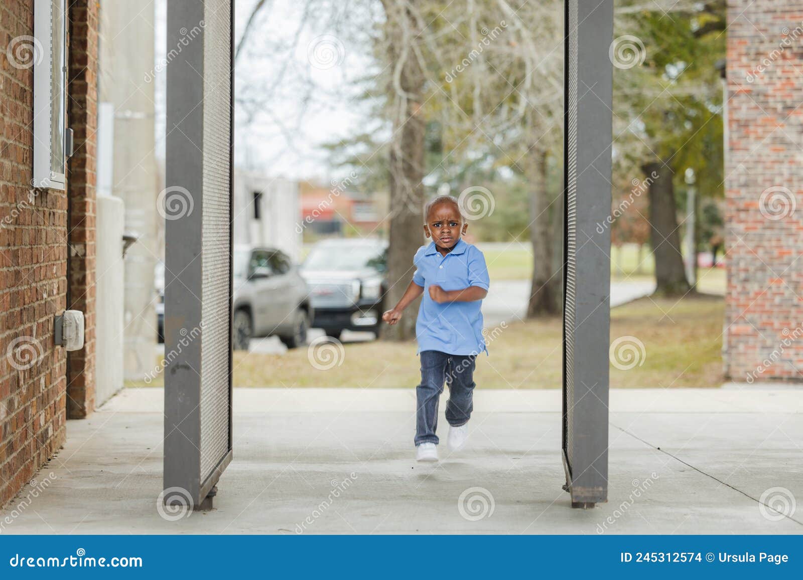 A Cute Little Boy Running and Playing Outside Stock Photo - Image of ...