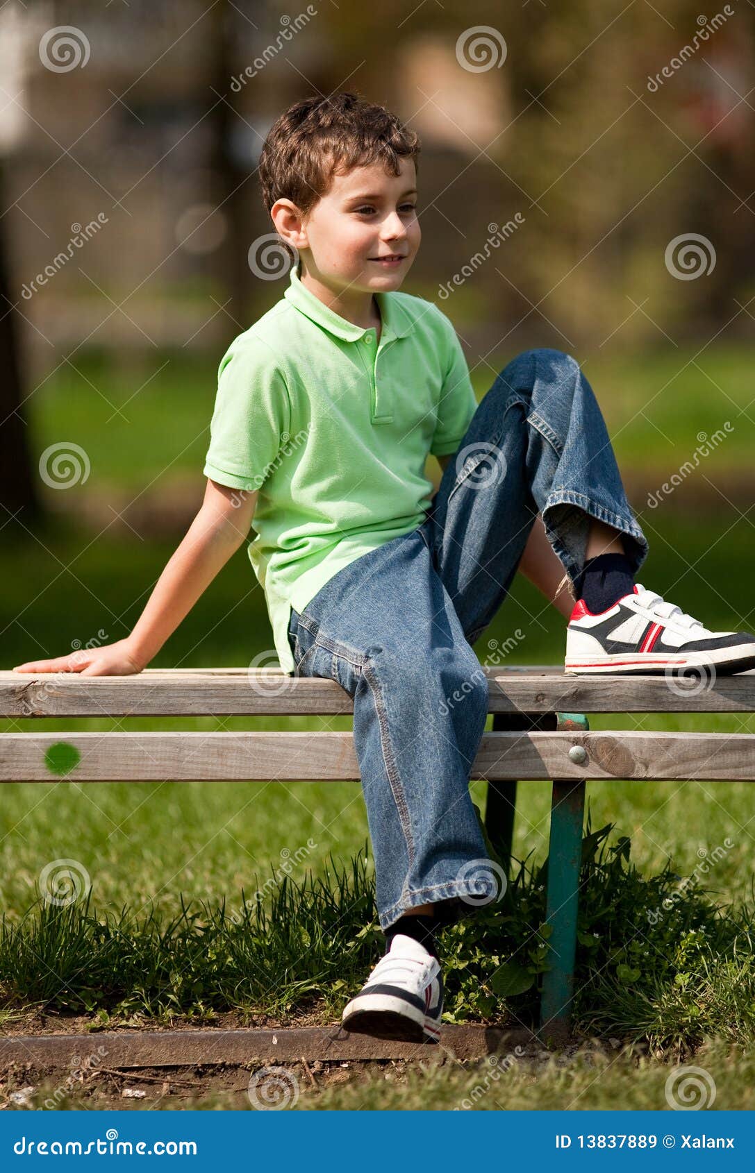 Cute Little Boy Sitting on a Bench Stock Image - Image of relaxation ...