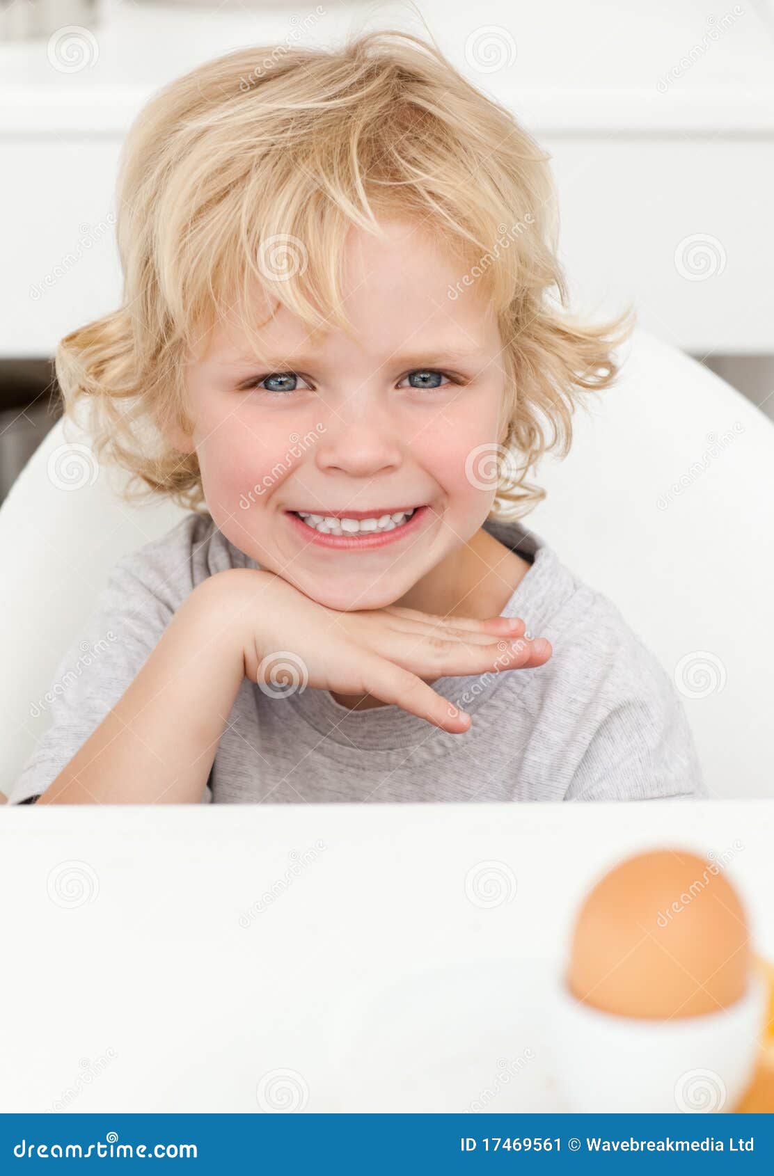 Cute Little Boy Sitting at a Table Stock Image - Image of happiness ...